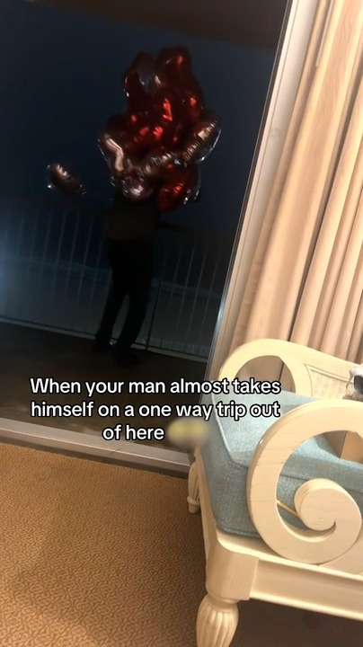 Person Almost Falls Off Balcony With Balloons | Jukin Licensing