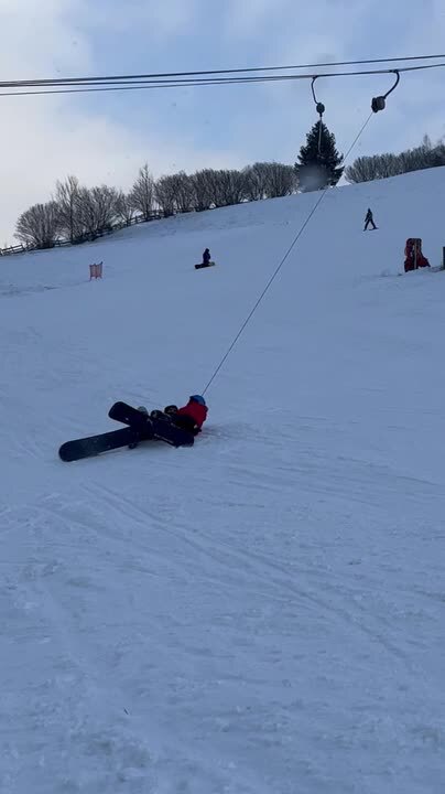 Snowboarders Fail Hilariously on Rope Tow Ski Lift! | Jukin Licensing
