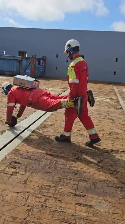 Offshore Workers Get Creative With Human Wheelbarrow | Jukin Licensing