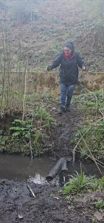 Woman Loses Footing on Wooden Log and Ends Up in the Water | Jukin ...