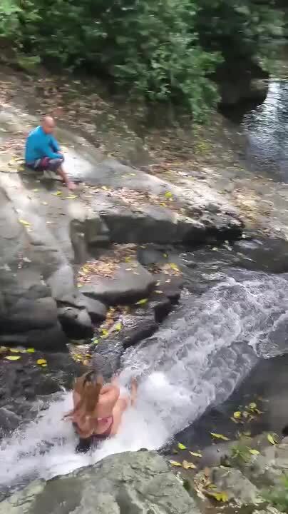 Woman Descends Waterfall, Unexpectedly Colliding With Boulder | Jukin ...