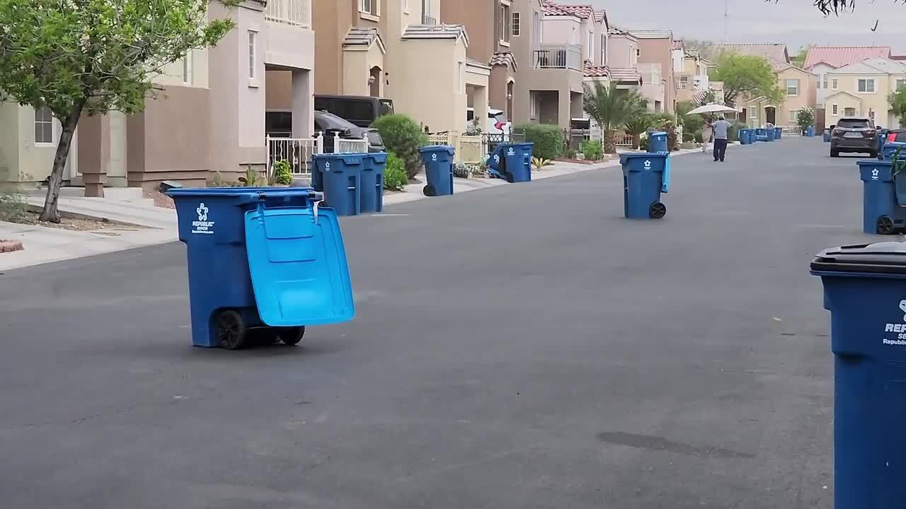 Strong Winds Make Trash Cans Roll Down Road on Their Own and Topple ...