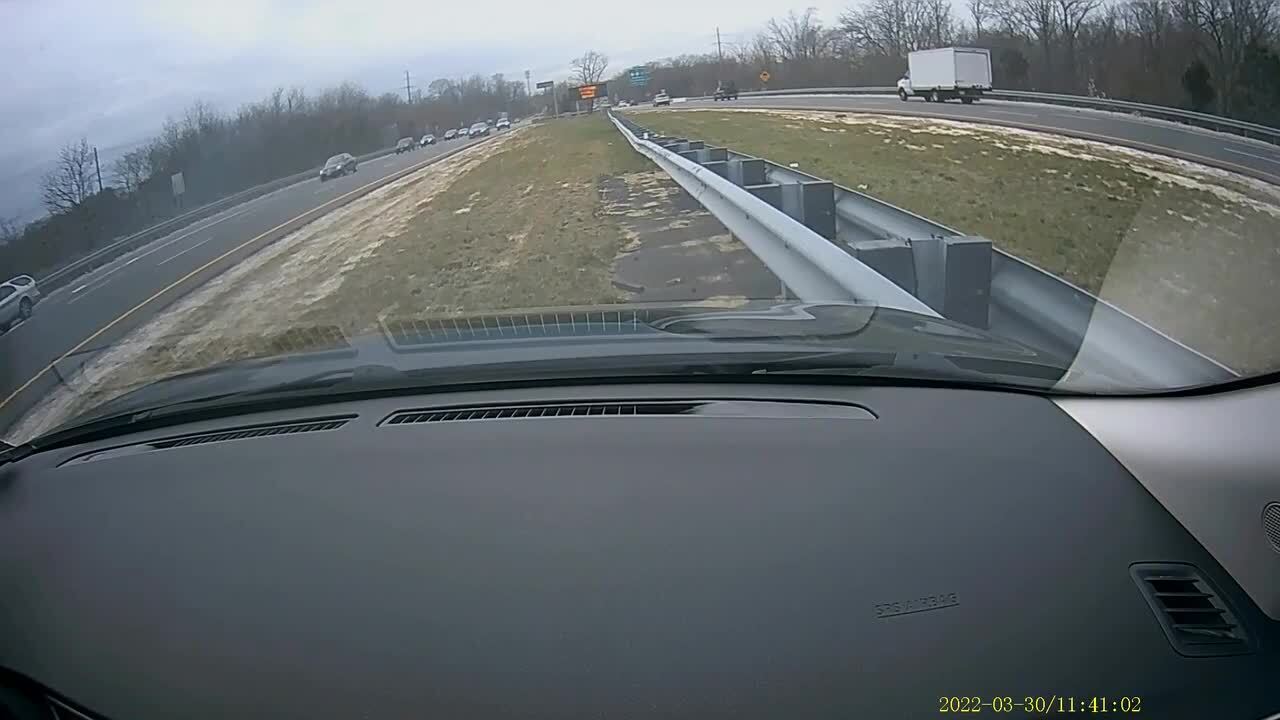 Car Loses Control on Highway and Swerves Off Road | Jukin Licensing