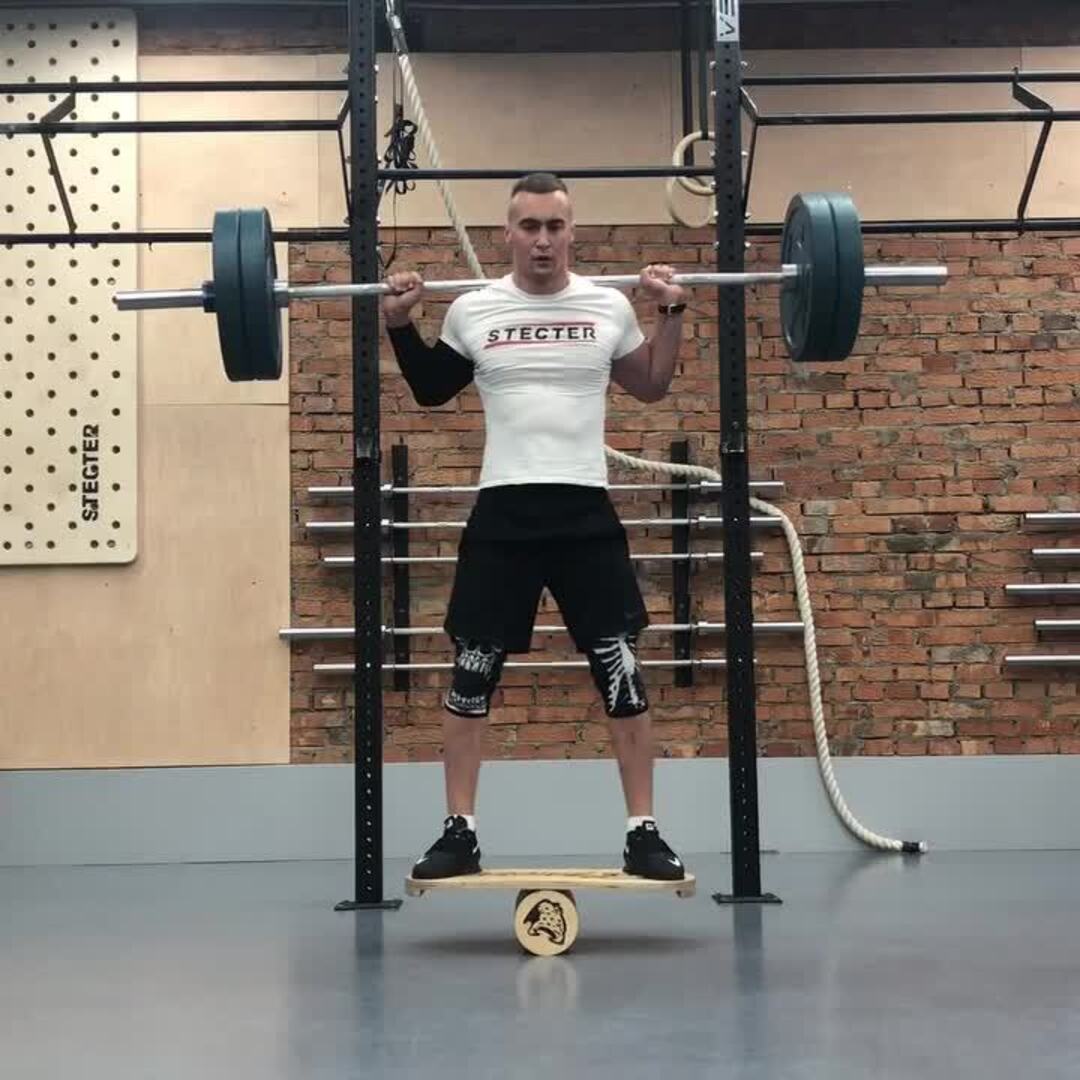 Unstable Squats: Man Performs Barbell Squats on Balance Board | Jukin ...