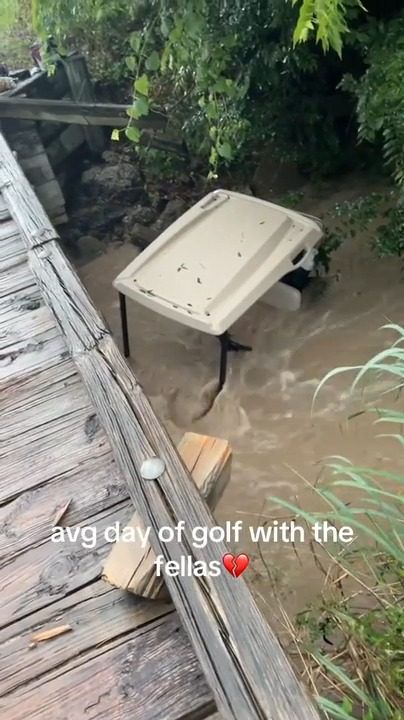 Men React After Crashing Golf Cart Down in Flowing Stream | Jukin Licensing