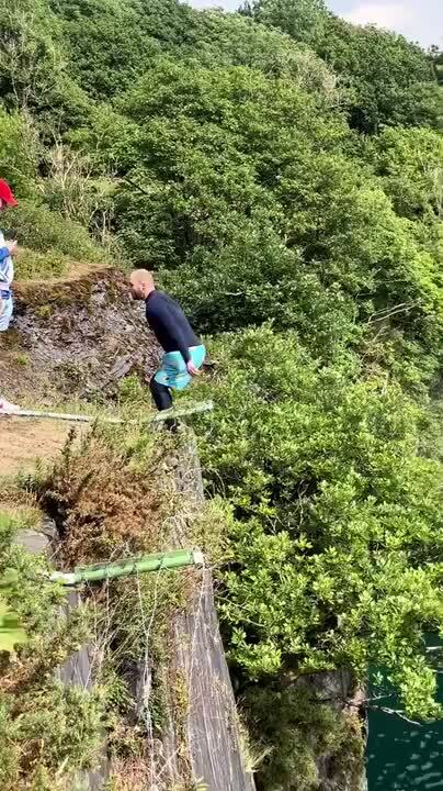 Man Falls Back First While Attempting Cliff Jump | Jukin Licensing